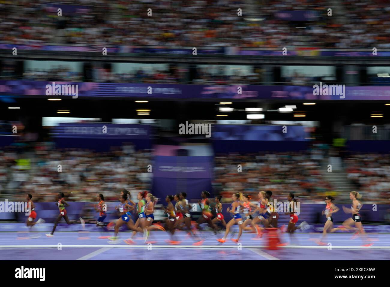 Runners compete in the women's 10,000-meter final at the 2024 Summer ...