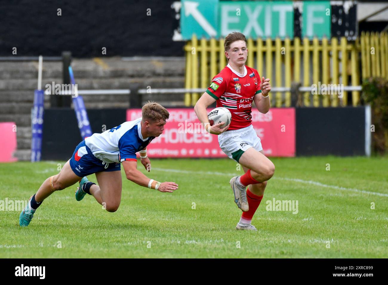 Neath, Wales. 3 August 2024. Samuel Dickenson of Wales evades the ...