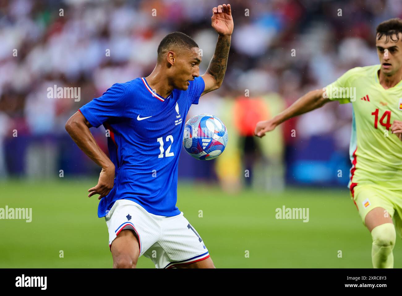 Paris, France, 9 August, 2024. Enzo Millot (12) of Team France controls ...
