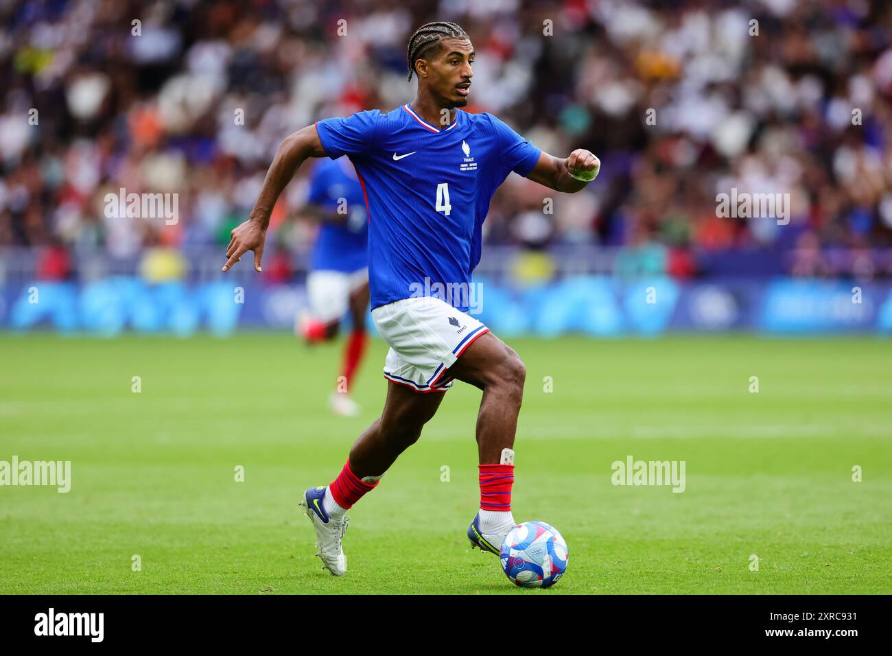 Paris, France, 9 August, 2024. Loic Bade (4) of Team France dribbles ...