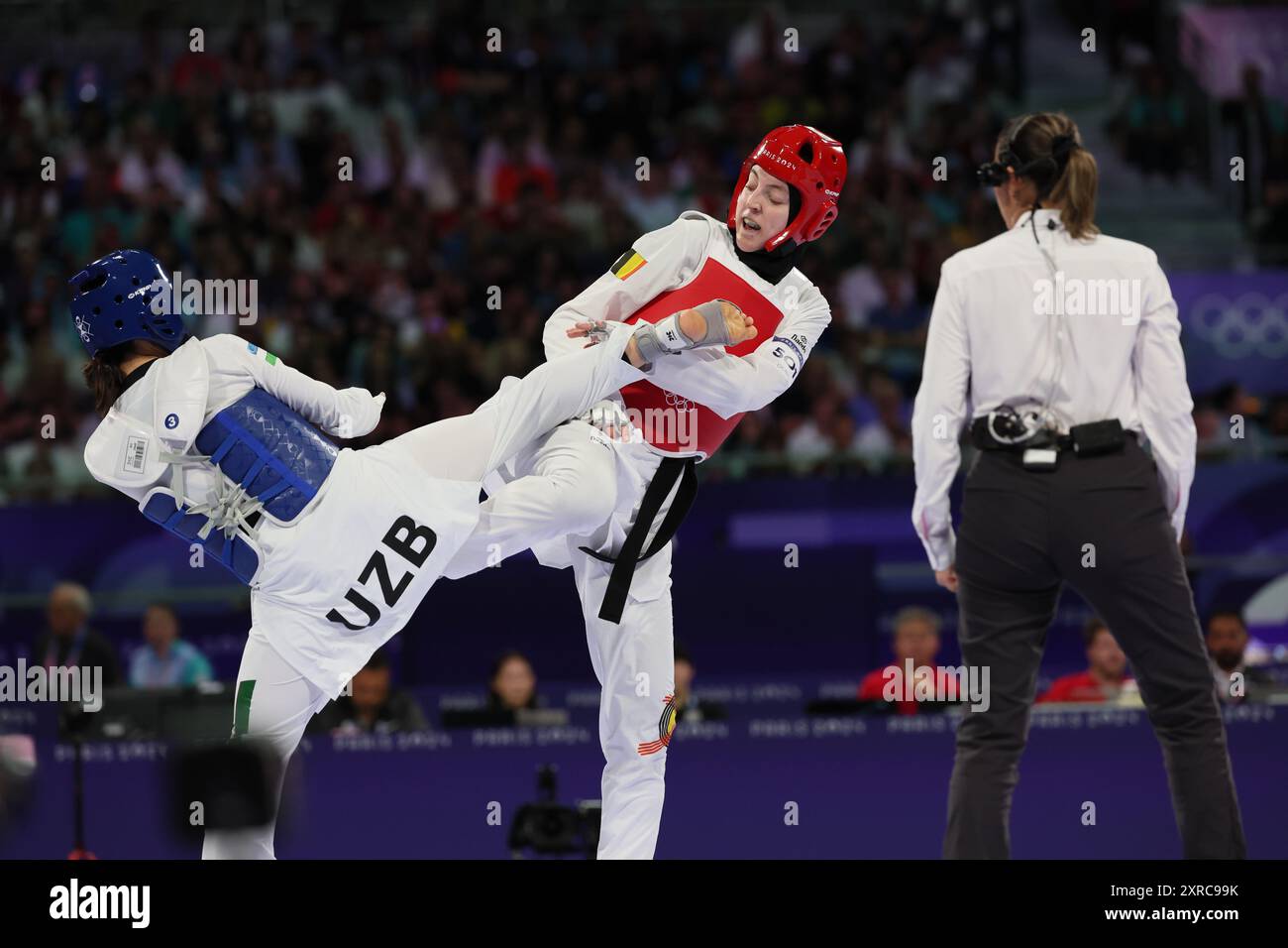 Paris, France. 09th Aug, 2024. Belgian taekwondoka Sarah Chaari (red ...