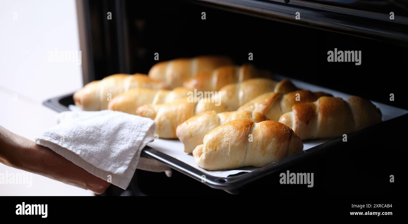 Open oven on a hot baking sheet, fresh baked goods Stock Photo - Alamy