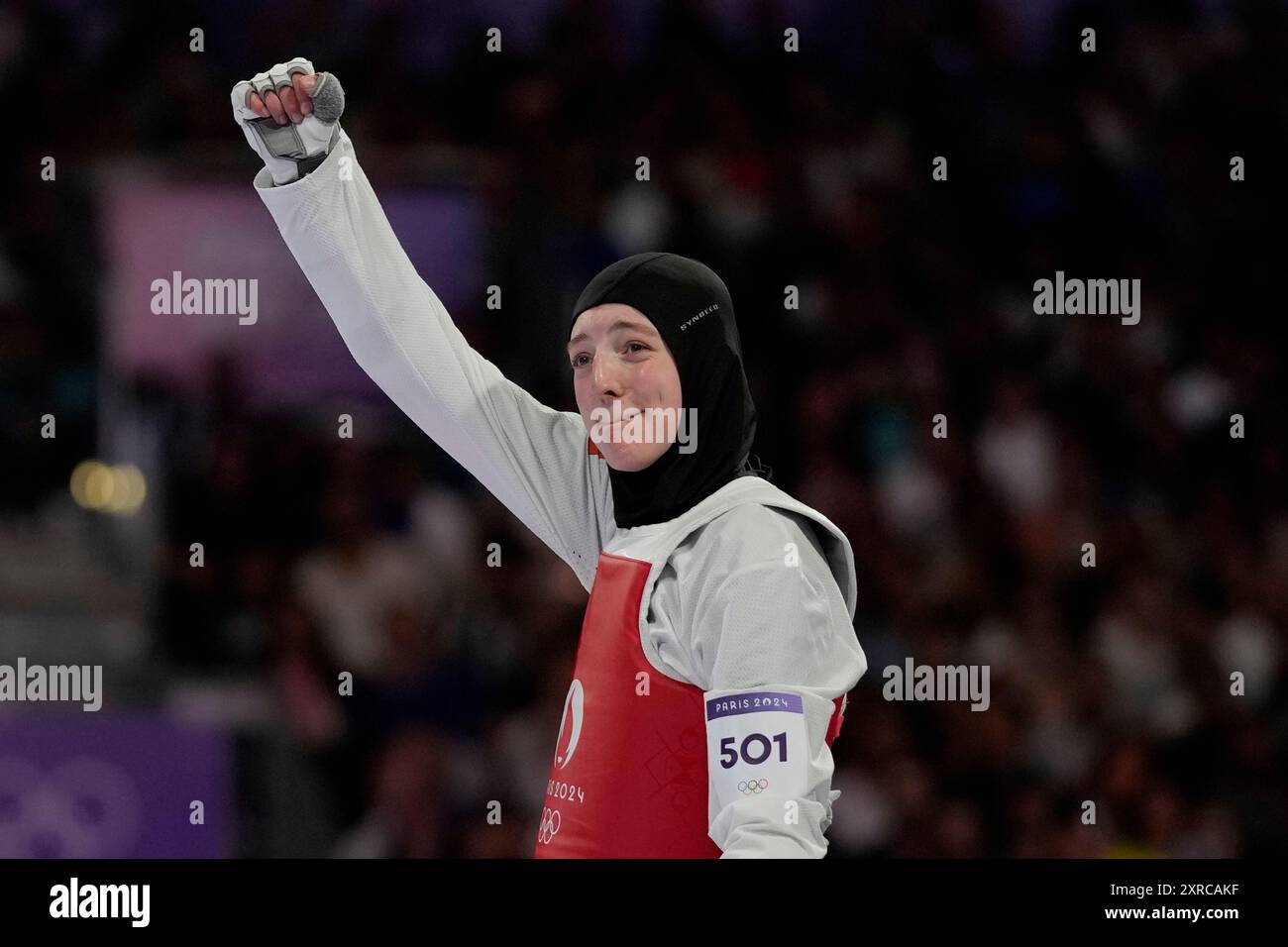 Belgium's Sarah Chaari celebrates after winning the women's 67kg ...