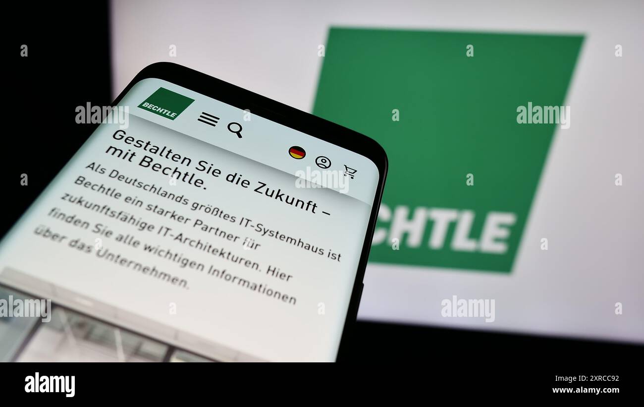 Smartphone with website of German information technology company ...