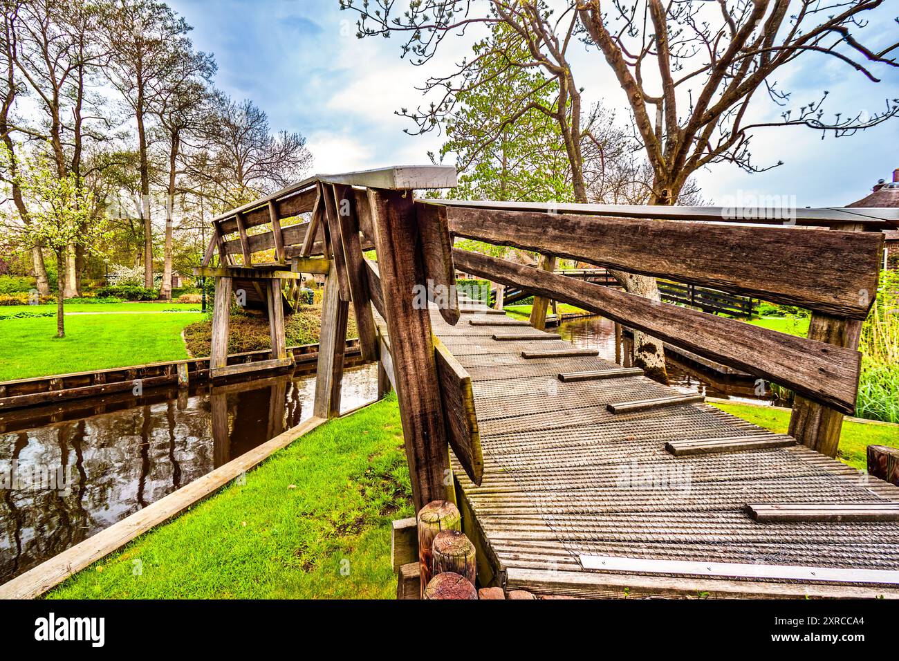 Wooden bridge over a canal in Giethoorn, the Netherlands Stock Photo ...