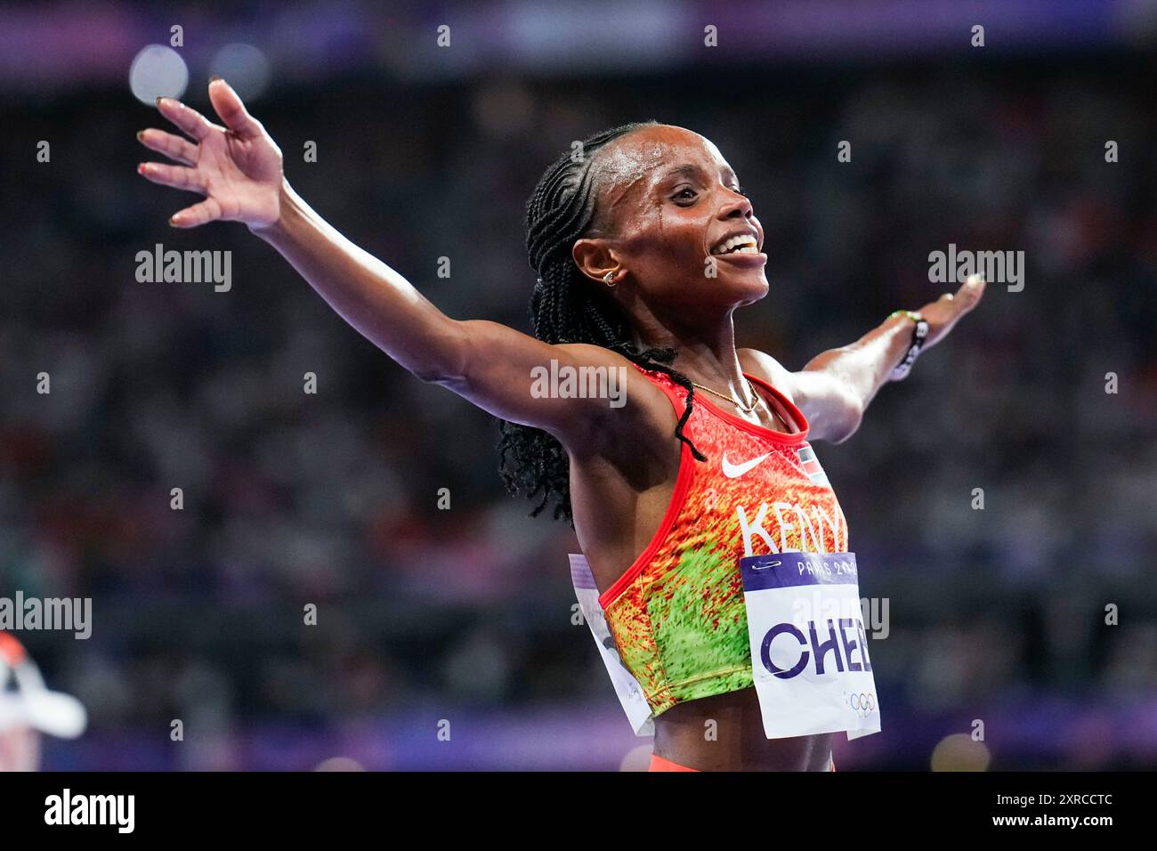 Beatrice Chebet, of Kenya, celebrates after winning the women's 10,000 ...