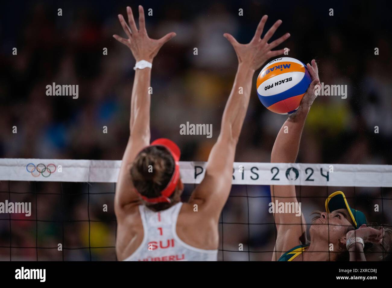 Australia's Mariafe Artacho del Solar hits the ball defended by ...