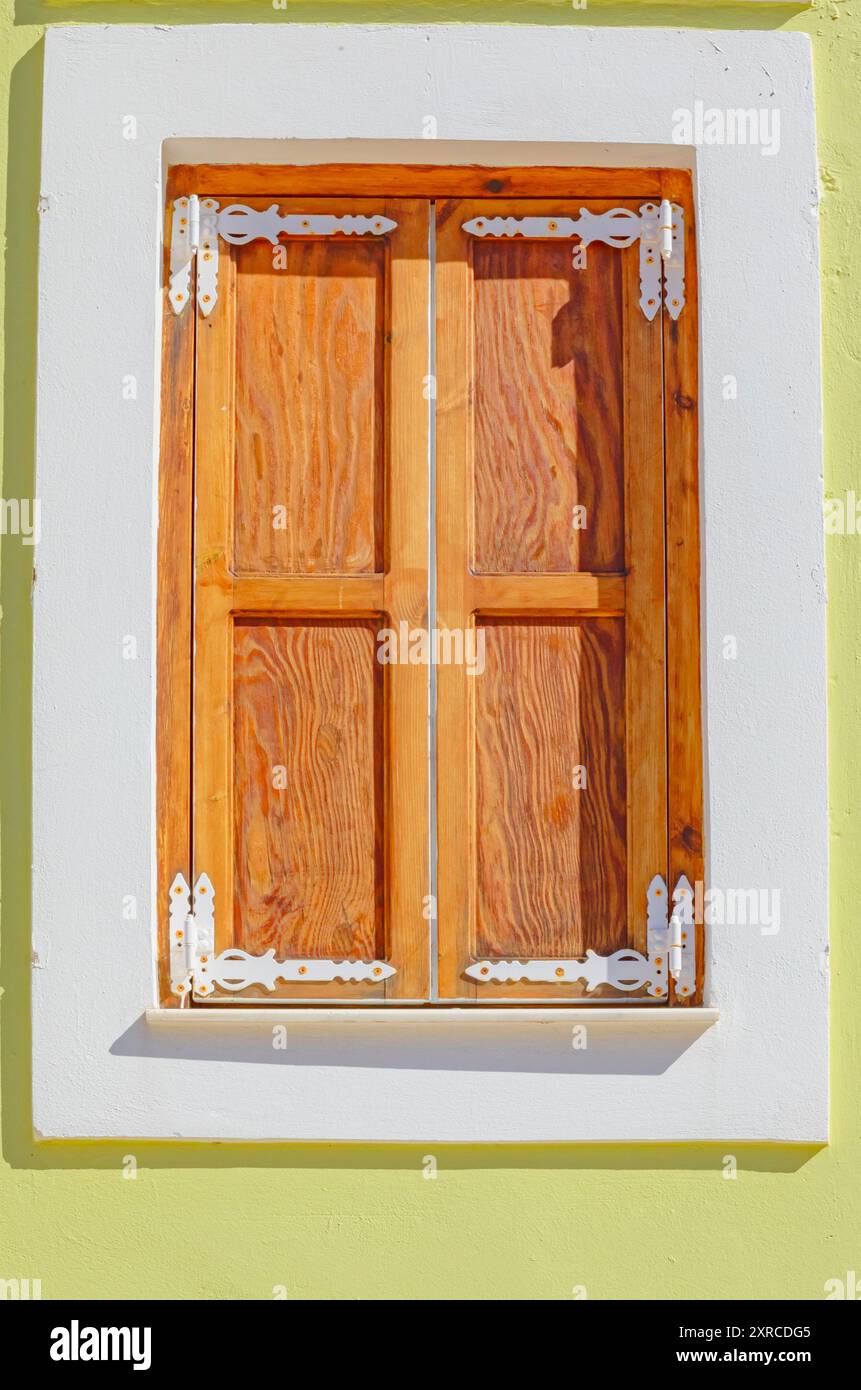 Shuttered window, Halki Island, Dodecanese Islands, Greece Stock Photo ...