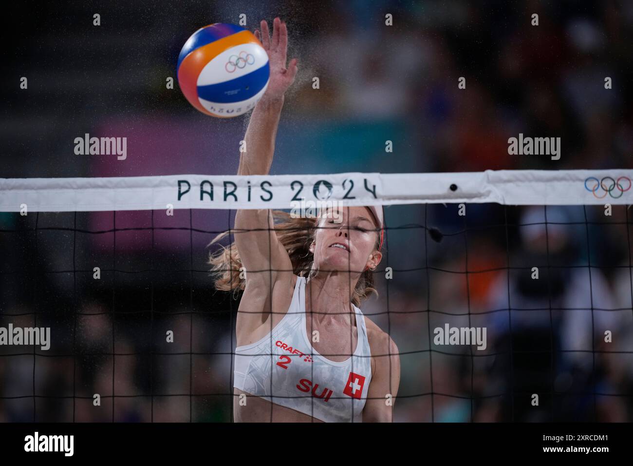 Switzerland's Nina Brunner hits the ball in the women's beach ...