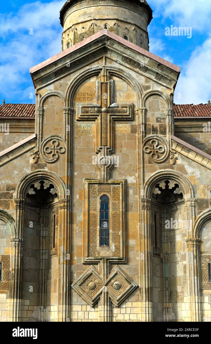 Richly decorated five-arched east facade with cross, ornamented window ...