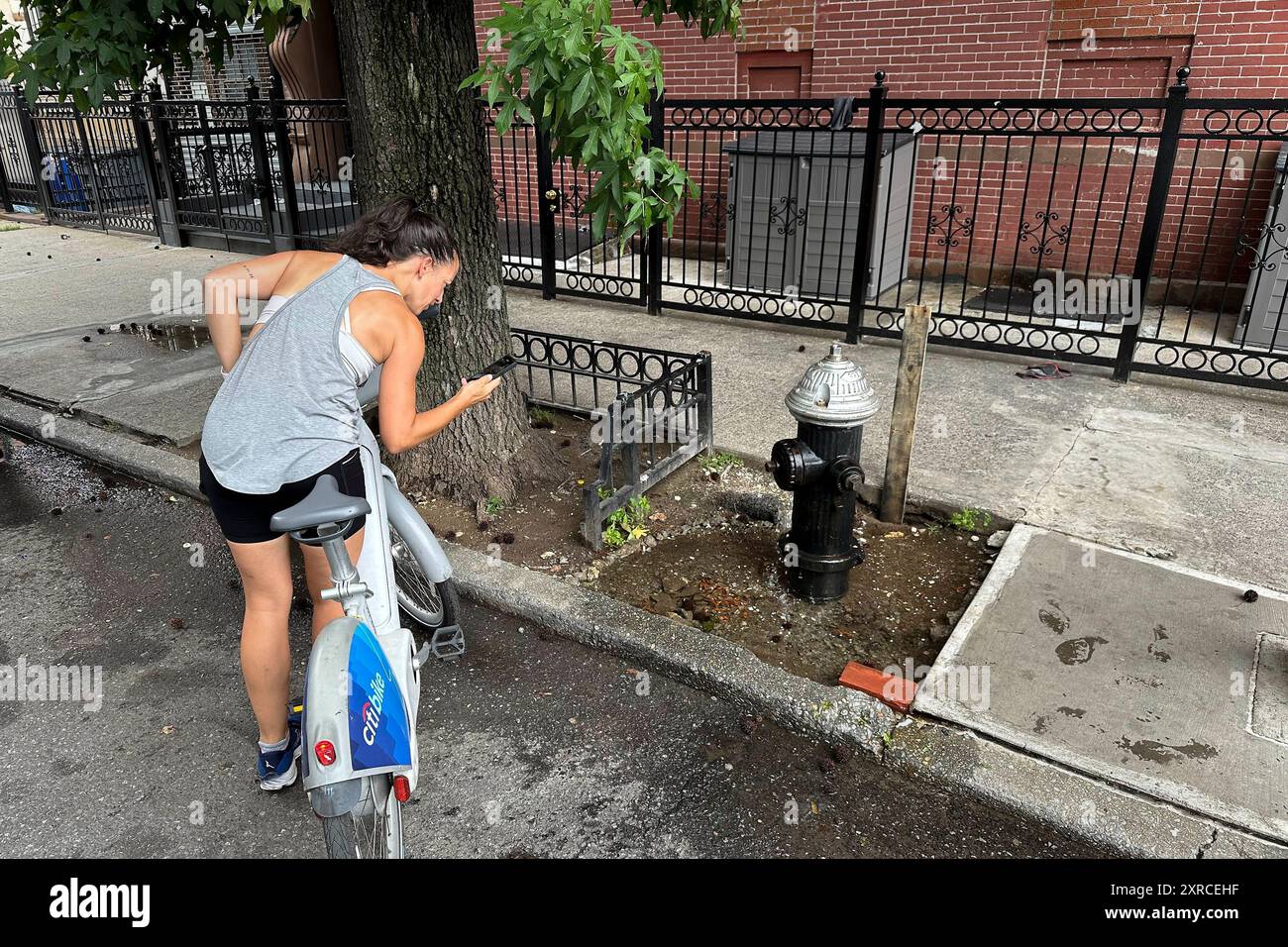 Georgia Ramirez Wright stops riding her bike to take a photo of ...
