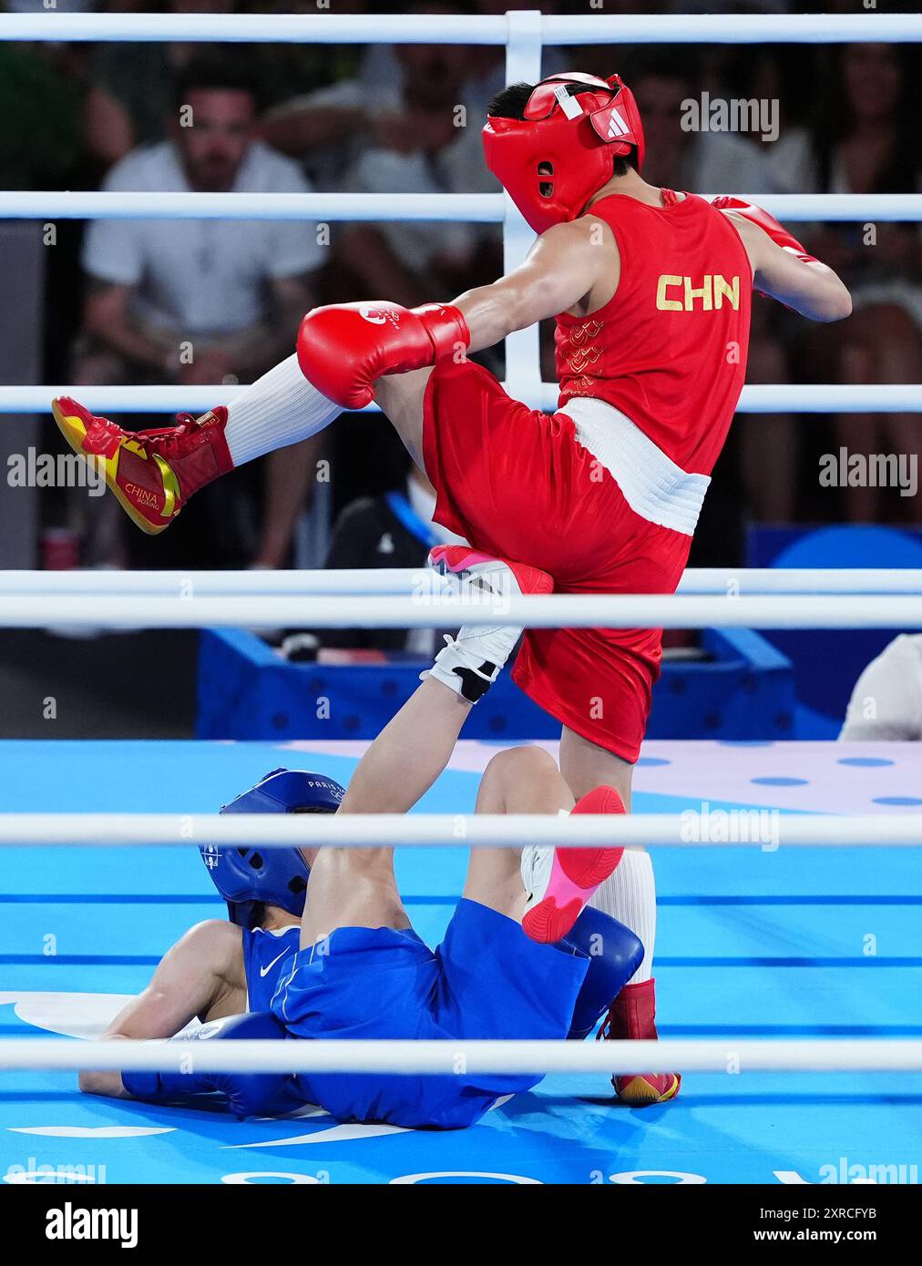 China’s Yu Wu (right) in action against Turkey’s Buse Naz Cakiroglu ...