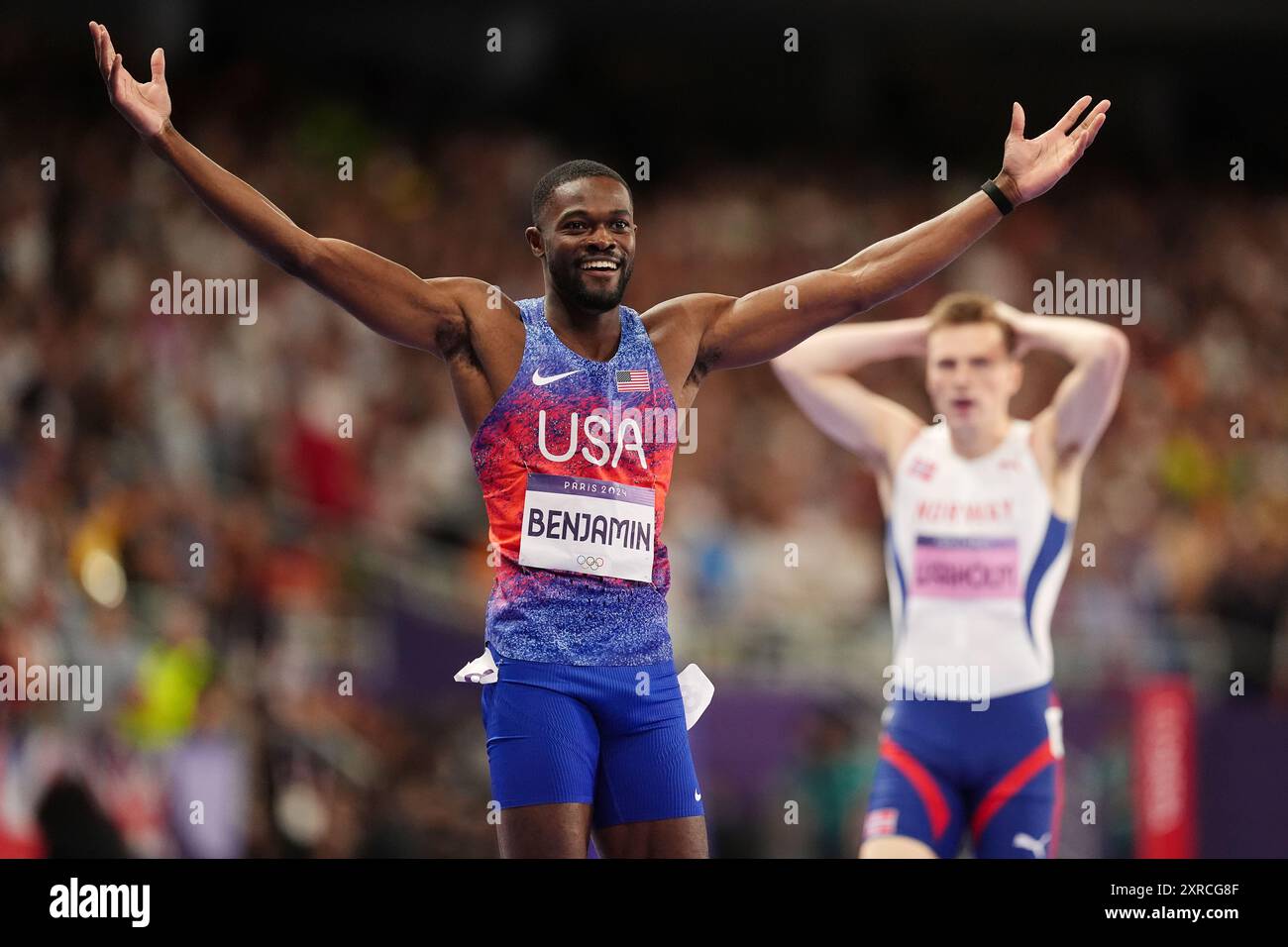 USA's Rai Benjamin (left) celebrates winning gold as Norway's Karsten ...