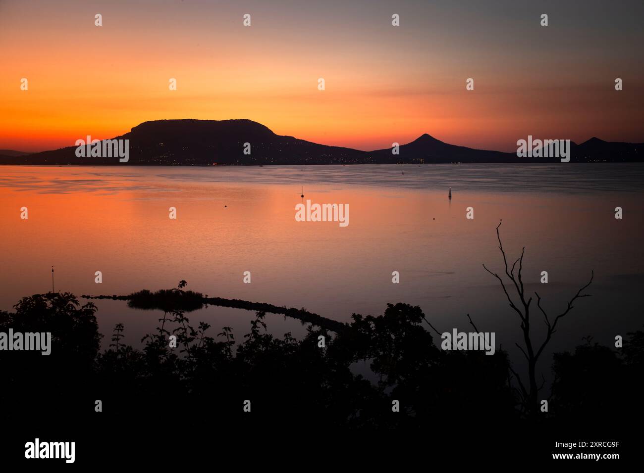 The lake Balaton with mount Badacsony Stock Photo - Alamy