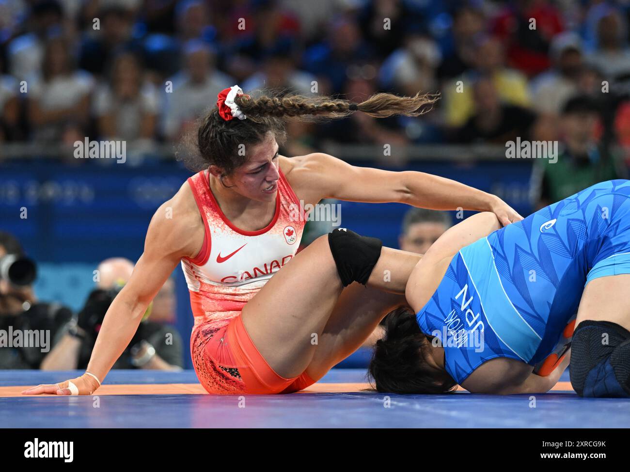 Paris, France. 9th Aug, 2024. Ana Paula Godinez Gonzalez (in red) of ...