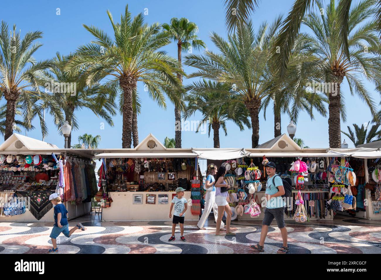 Alicante, Spain. 09th Aug, 2024. Tourists visit a street market located ...