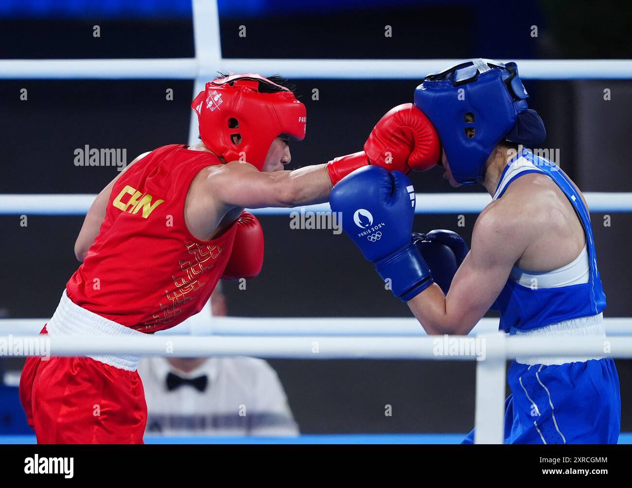 China’s Yu Wu (left) in action against Turkey’s Buse Naz Cakiroglu ...