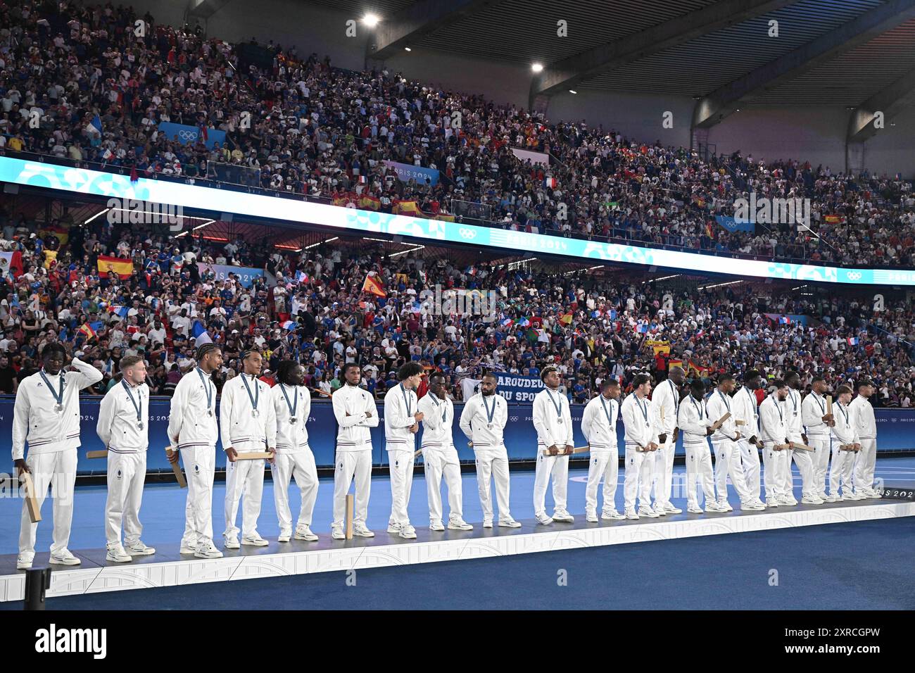 Paris, France. 09th Aug, 2024. Football players of Team France stand ...