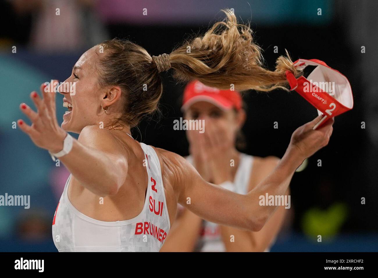 Switzerland's Nina Brunner, left, and Tanja Hueberli, react as they win ...