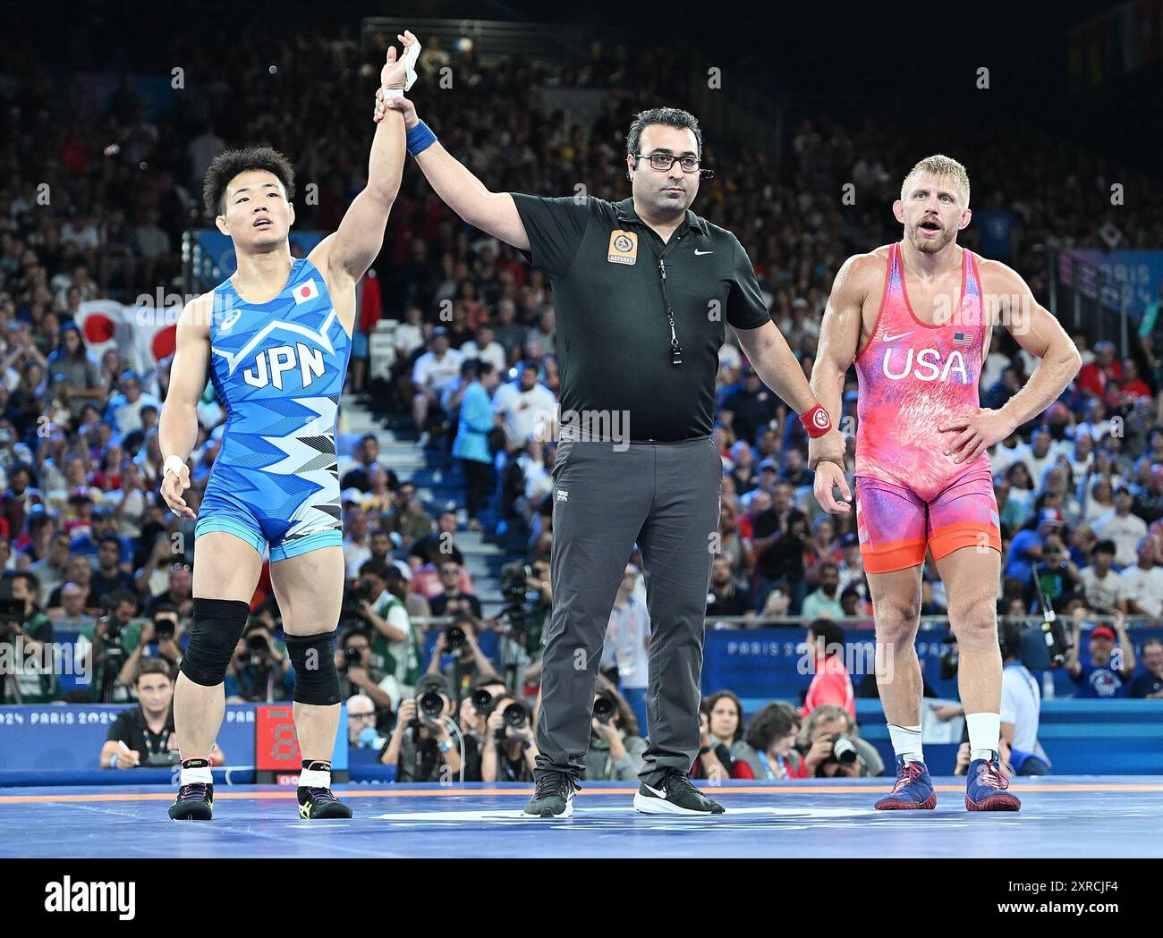 Paris, France. 9th Aug, 2024. Takatani Daichi of Japan has his hand raised after the men's ...
