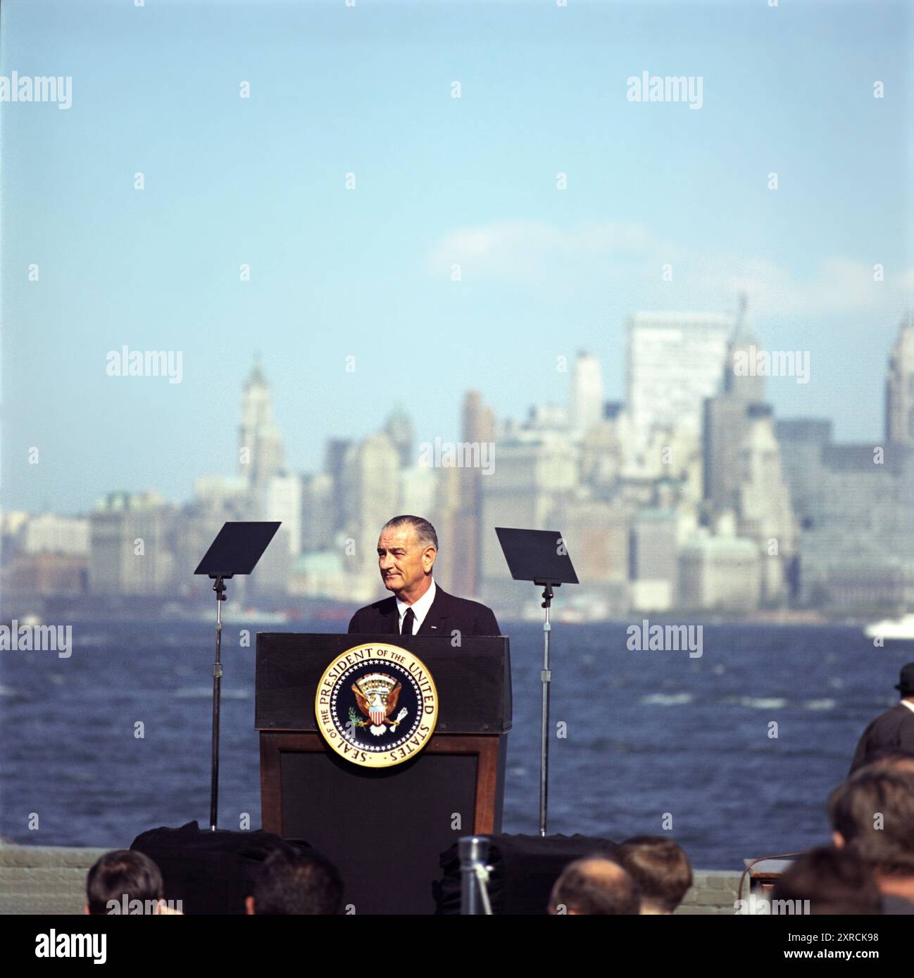 U.S. President Lyndon B. Johnson speaking at podium before signing the ...