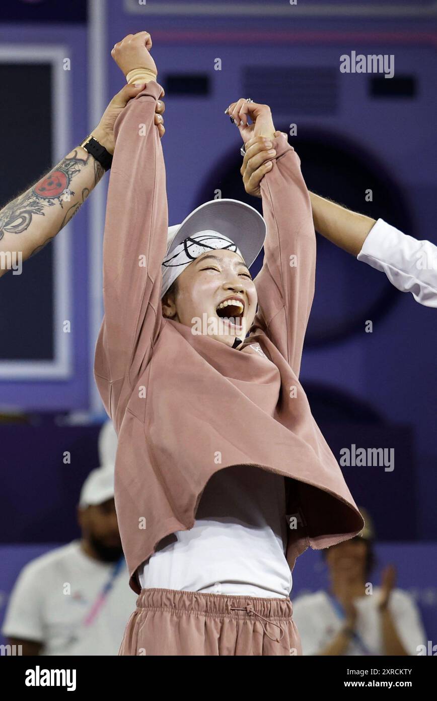 Japan's Ami Yuasa celebrates after winning the women's breaking gold ...