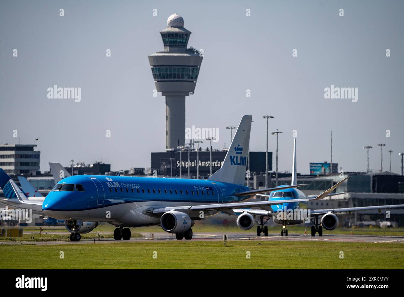 Aircraft at Amsterdam Schiphol Airport, on the taxiway for take-off on ...
