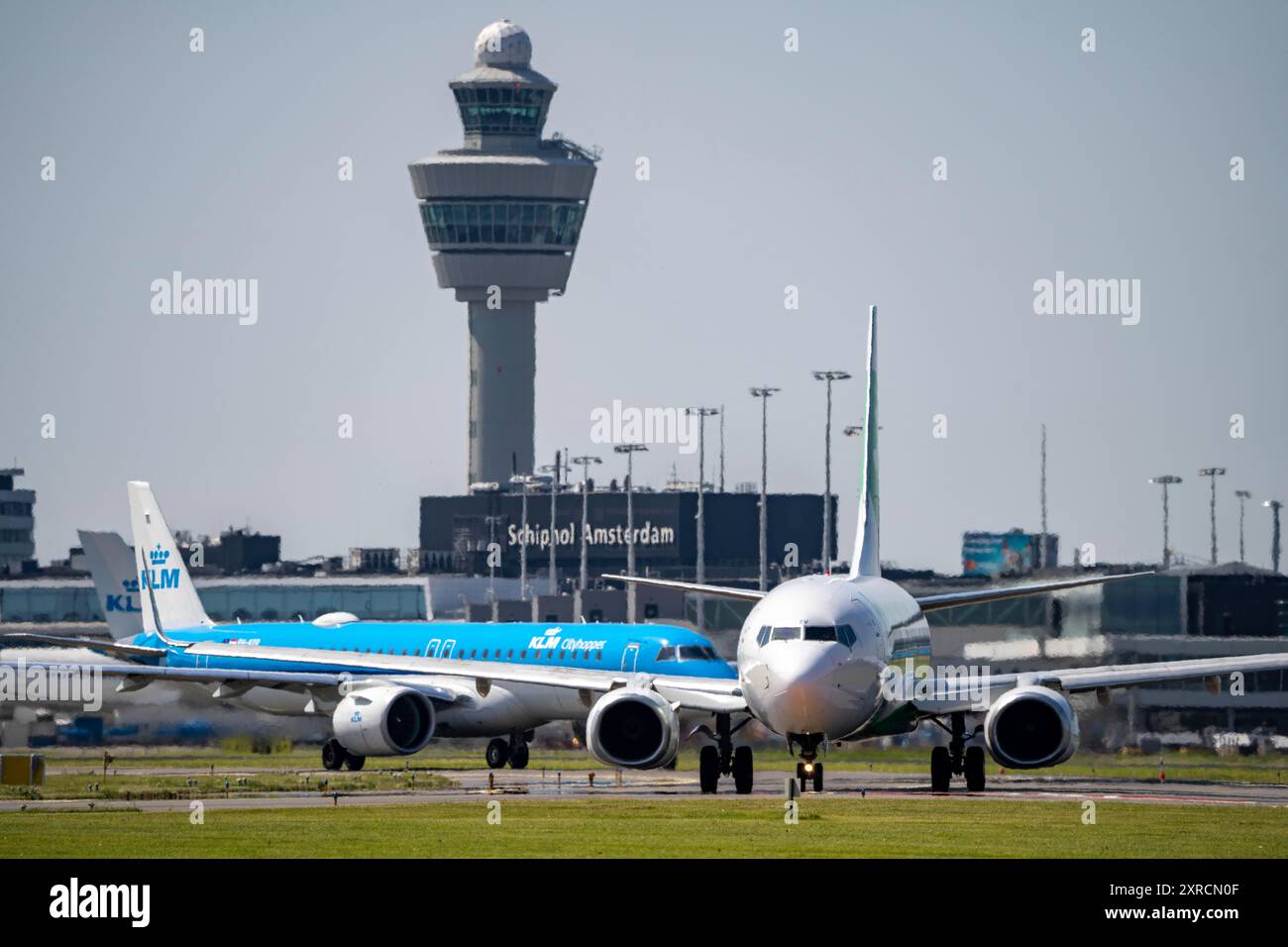 Aircraft at Amsterdam Schiphol Airport, on the taxiway for take-off on ...