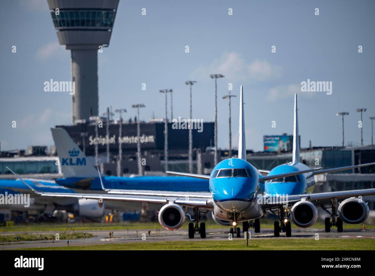 Aircraft at Amsterdam Schiphol Airport, on the taxiway for take-off on ...
