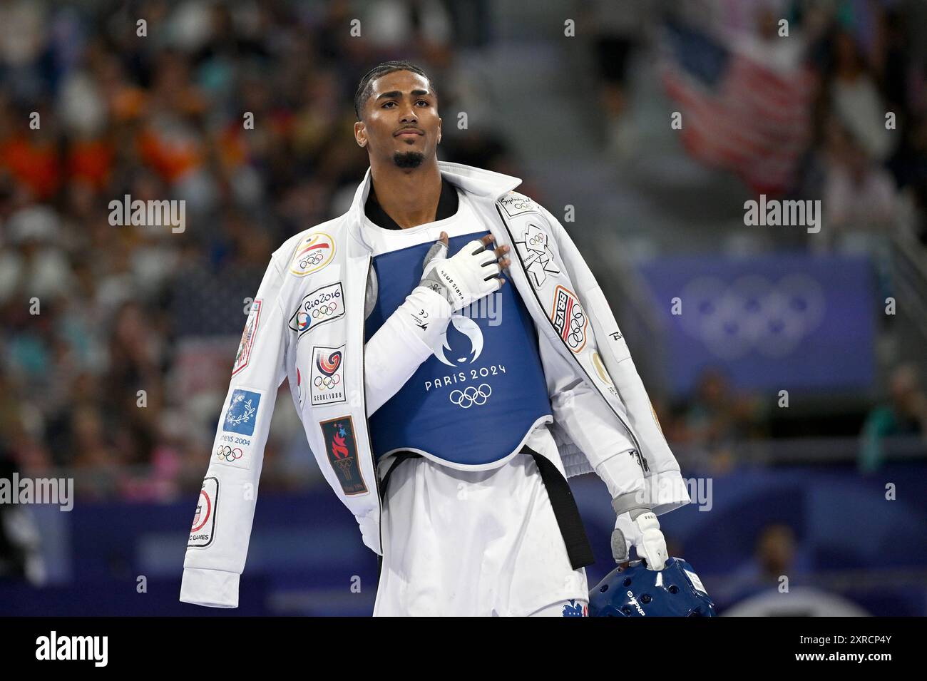 Paris, Fra. 09th Aug, 2024. CJ Nickolas of Team USA (blue) salutes the ...