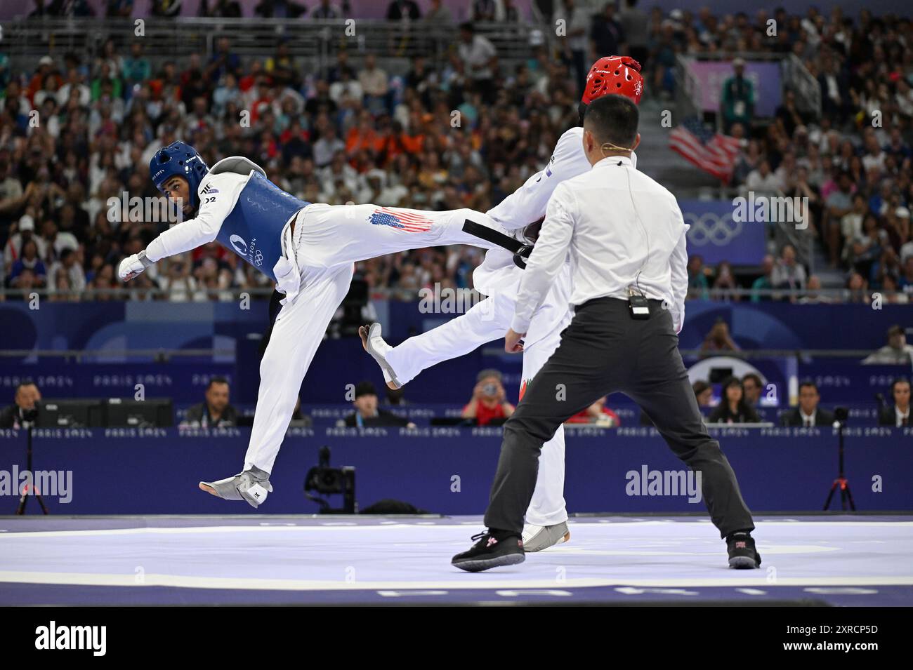 Paris, Fra. 09th Aug, 2024. CJ Nickolas of Team USA (blue) competes ...