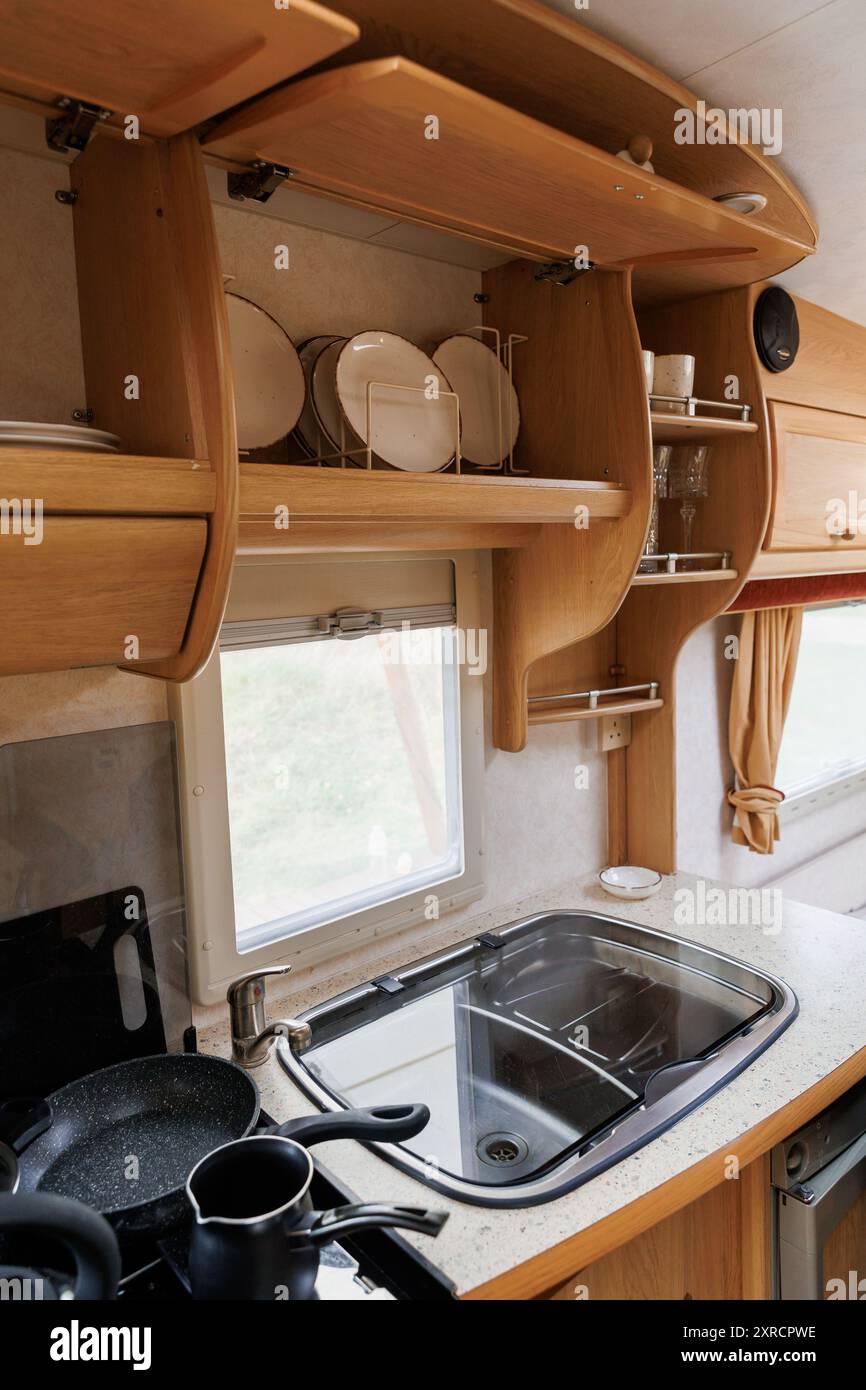 Cozy Caravan Interior with Kitchen and Sleeping Area. Ideal for ...