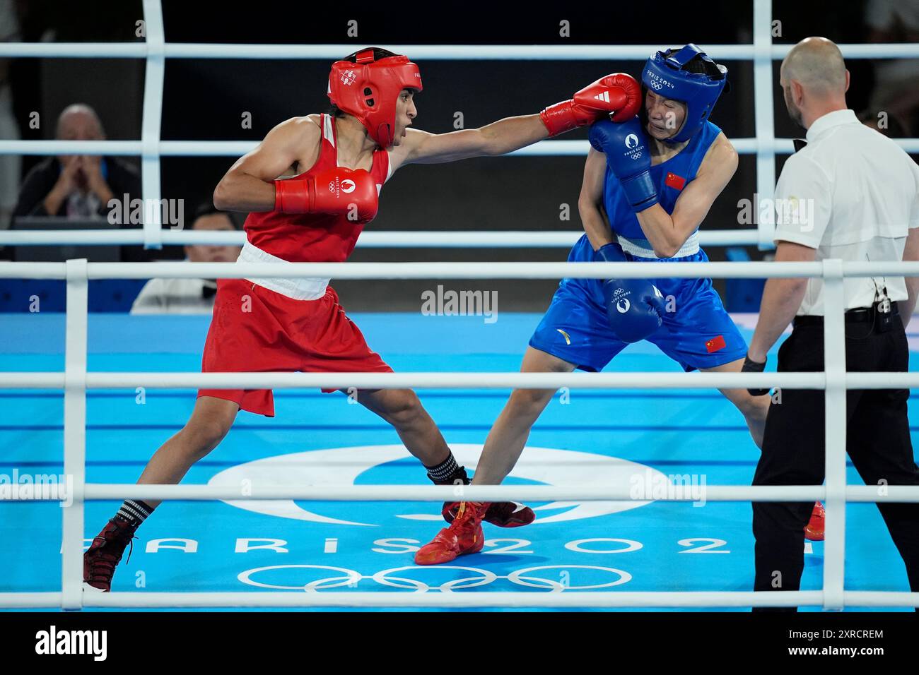 Algeria's Imane Khelif, left, fights China's Yang Liu in their women's ...