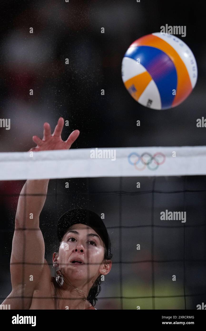 Canada's Melissa Humana-Paredes hits over the net in the women's beach ...