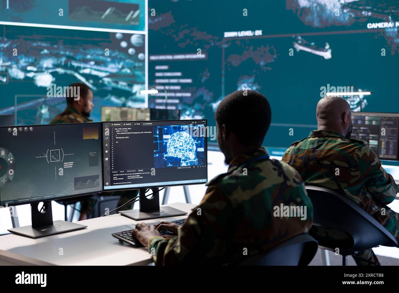 Military professionals in a mission control center employs modern ...