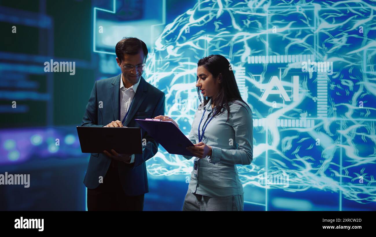 AI researcher and coworker working with artificial intelligence neural ...