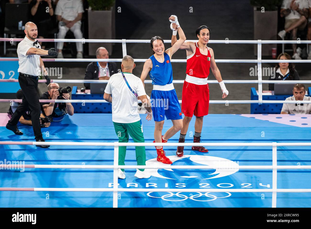 Imane Khelif of, Algeria. , . (red) celebrates after winning against ...