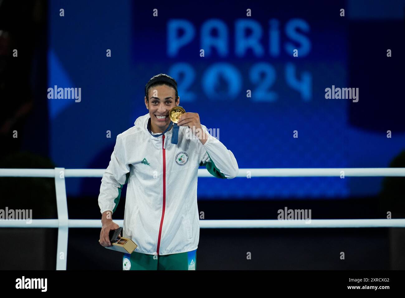 Gold medalist Algeria's Imane Khelif poses during a medals ceremony for ...