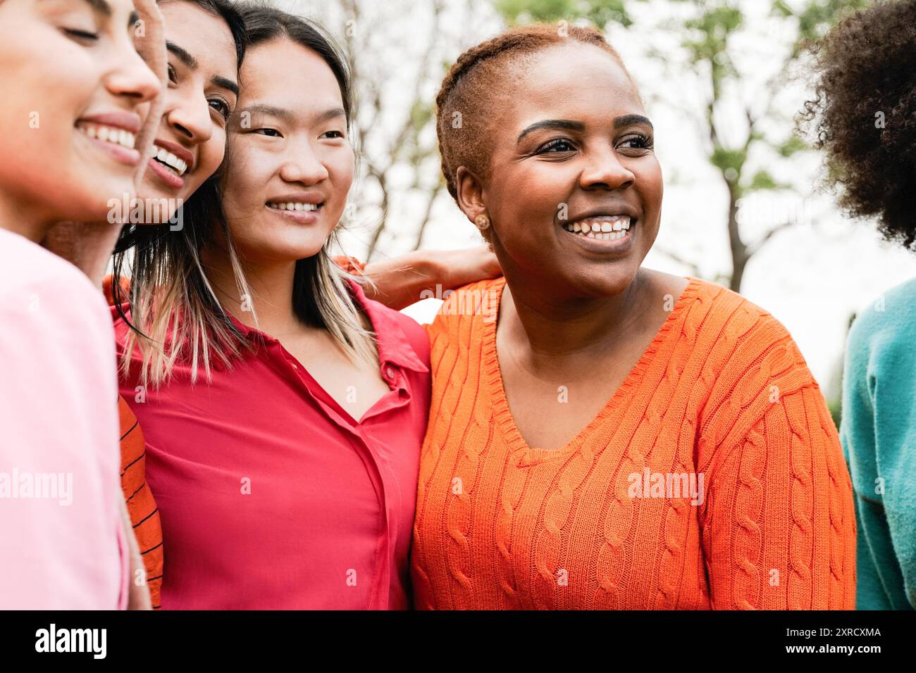 Diverse group of women having fun together. Happy multicultural people ...