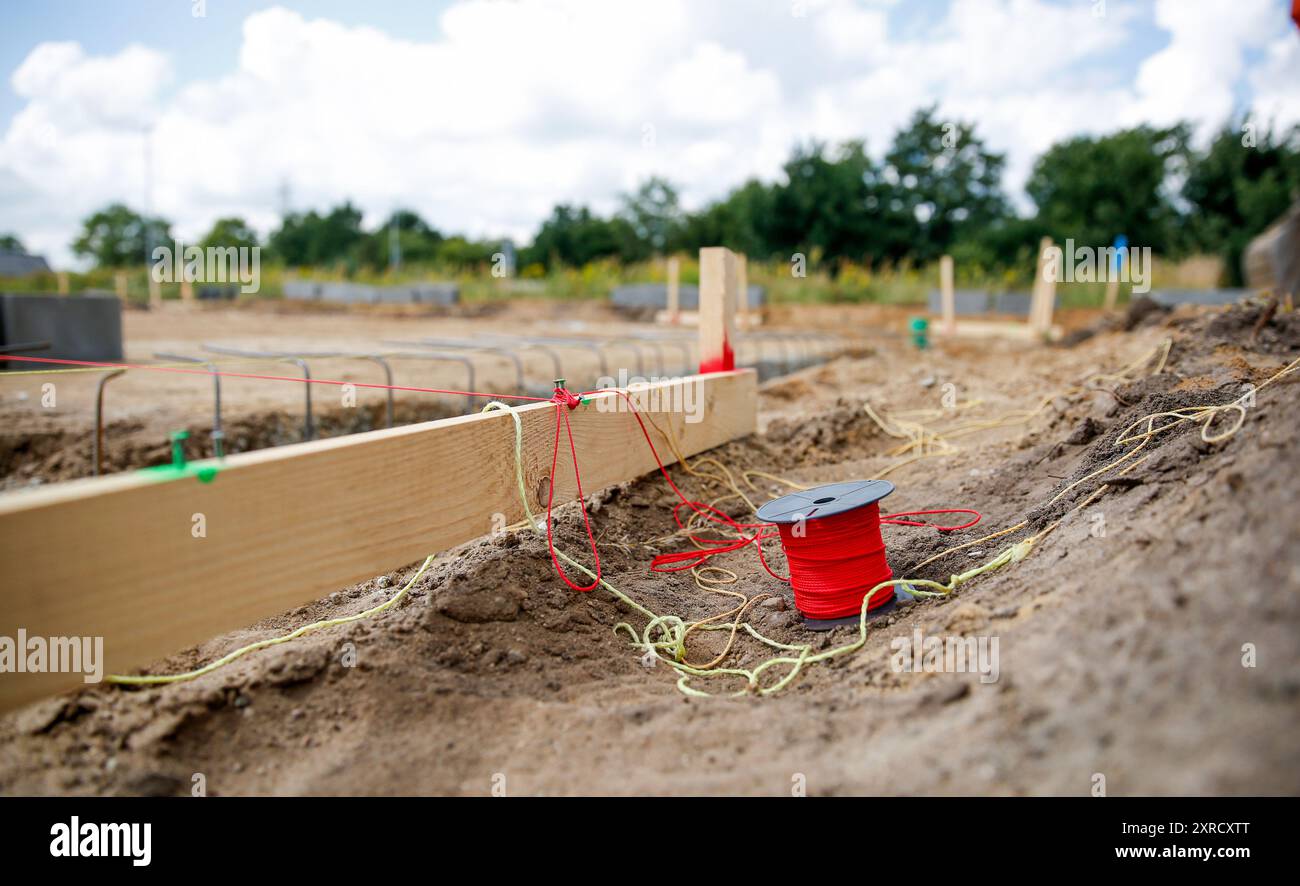 Close up of measuring rope line on the ground of a construction site ...