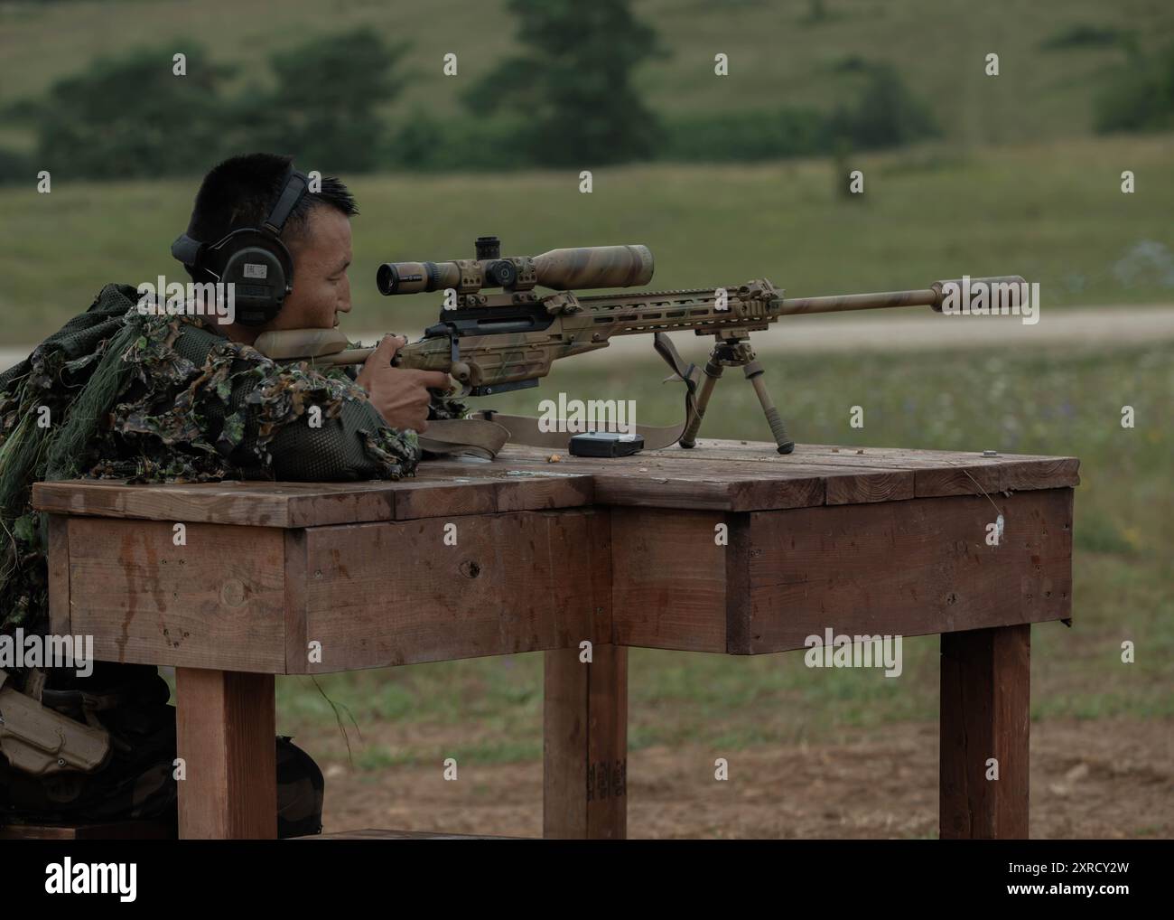 A French soldier fires his Sako TRG M10 Sniper Weapon System at a ...