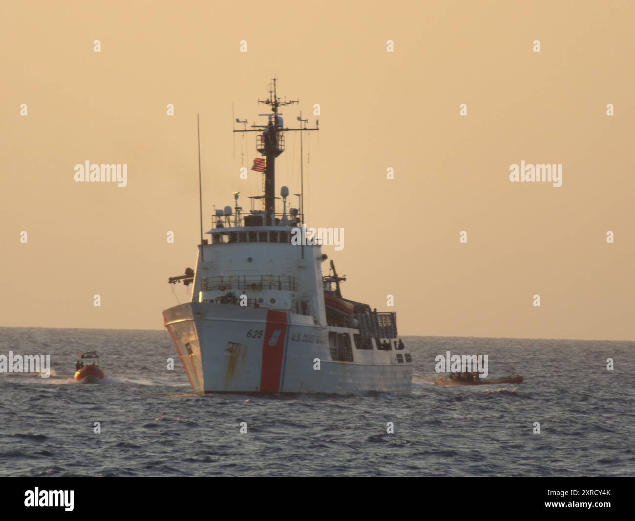 Coast Guard Cutter Venturous (WMEC 625) conducts small boat operations ...