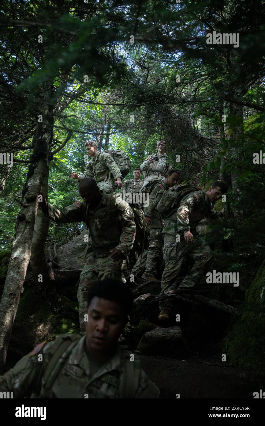 Soldiers from across the 10th Mountain Division descend Lower Wolfjaw ...