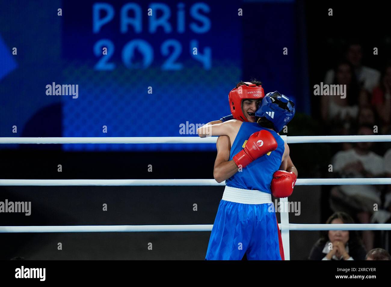 Algeria's Imane Khelif and China's Yang Liu embrace after Khelif won ...