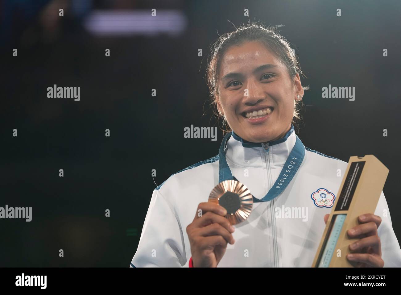 Bronze medalist Taiwan's Chen Nien-chin poses during a medals ceremony ...