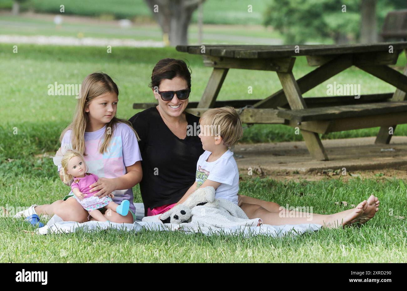 Katie Higdon relaxes with her children, Caroline Higdon, 8, and Beau ...