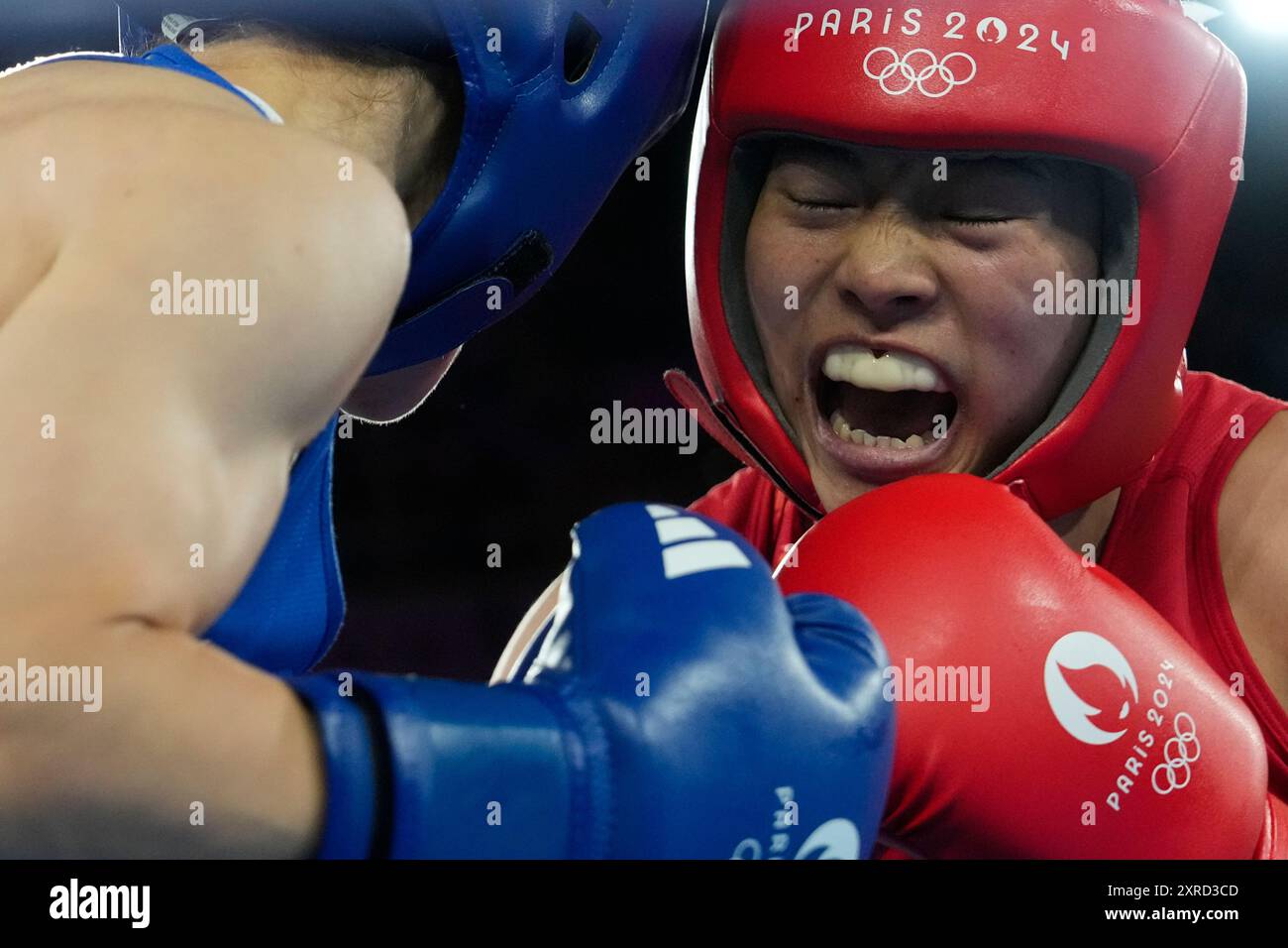 China's Wu Yu, right, fights Turkey's Buse Naz Cakiroglu in their women ...