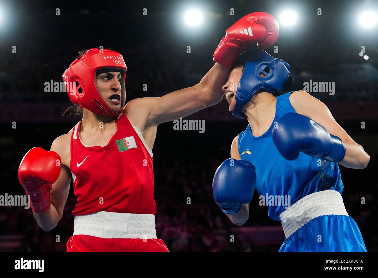 Algeria's Imane Khelif, left, fights China's Yang Liu in their women's ...