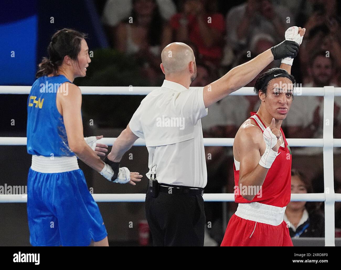 Paris, France. 9th Aug, 2024. Imane Khelif (in red) of Algeria is ...