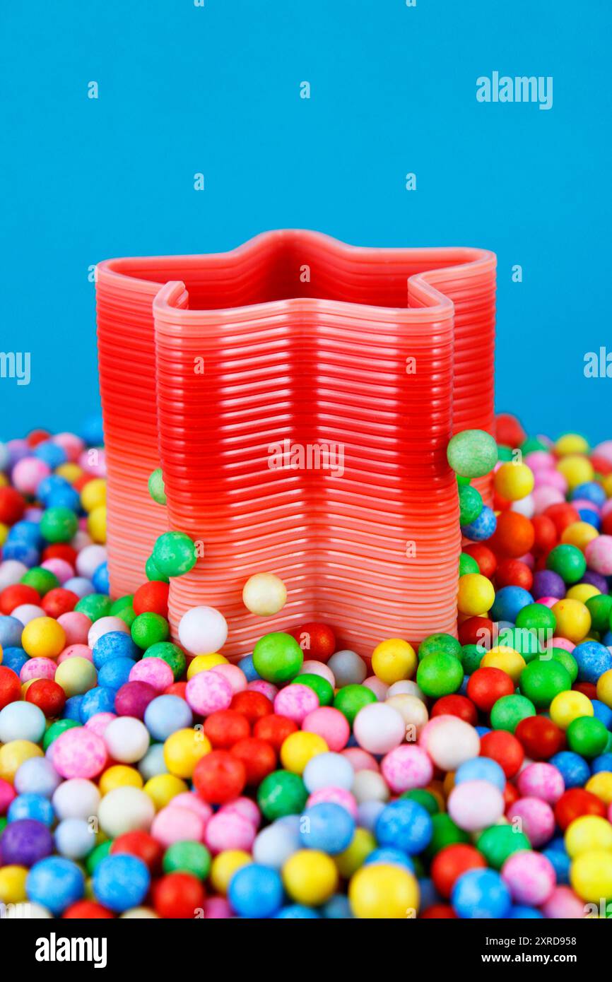 Colorful spheres inside star shaped column Stock Photo - Alamy